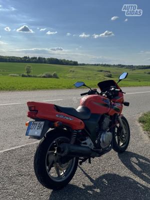 Red Honda CB 500F 2000 in Sirvintos, with an engine capacity of 0.50 L and mileage of 24 thousand km for 1700 €, photo 4 on AUTOMOTO.COM.LV