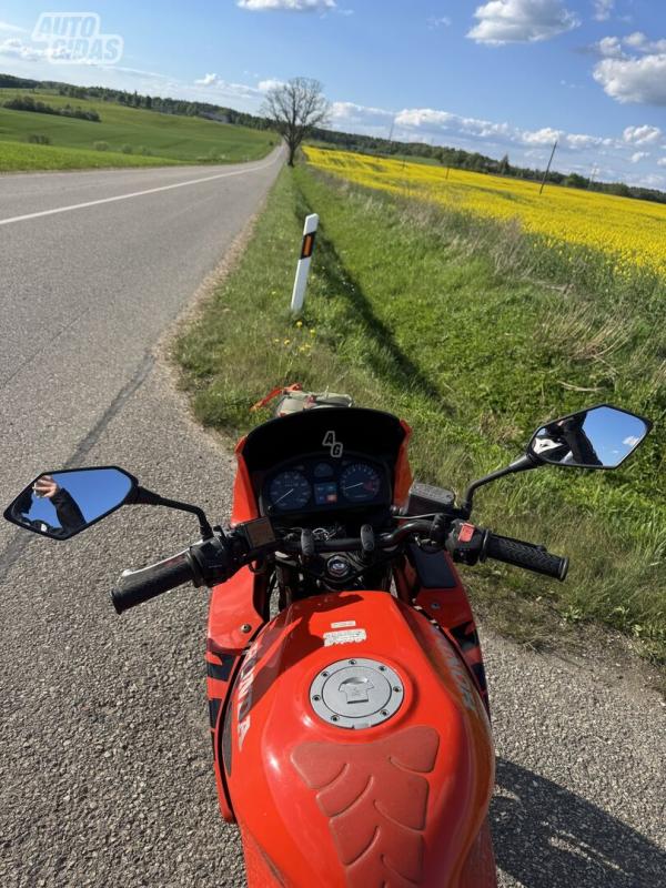 Red Honda CB 500F 2000 in Sirvintos, with an engine capacity of 0.50 L and mileage of 24 thousand km for 1700 €, photo 6 on AUTOMOTO.COM.LV