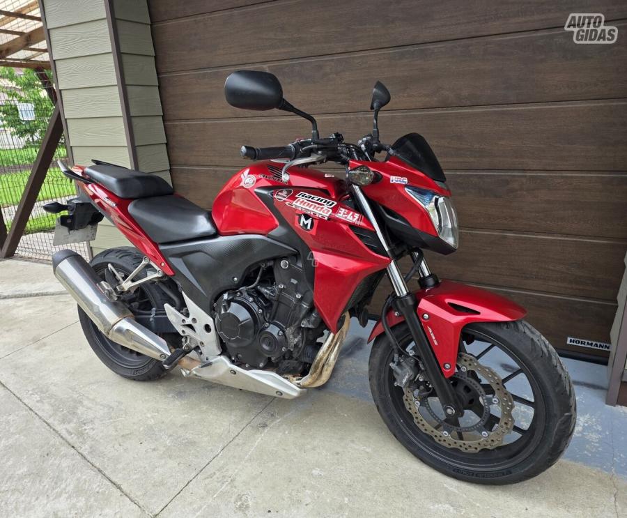 Red Honda CB 500F 2014 in Pasvalys, with an engine capacity of 0.50 L and mileage of 60 thousand km for 1749 €, photo 1 on AUTOMOTO.COM.LV