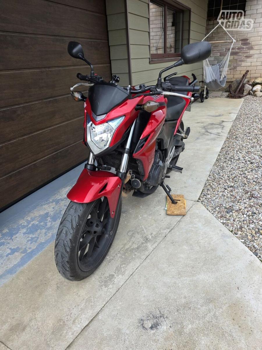 Red Honda CB 500F 2014 in Pasvalys, with an engine capacity of 0.50 L and mileage of 60 thousand km for 1749 €, photo 5 on AUTOMOTO.COM.LV