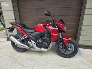 Red Honda CB 500F 2014 in Pasvalys, with an engine capacity of 0.50 L and mileage of 60 thousand km for 1749 €, photo 6 on AUTOMOTO.COM.LV