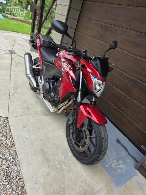 Red Honda CB 500F 2014 in Pasvalys, with an engine capacity of 0.50 L and mileage of 60 thousand km for 1749 €, photo 8 on AUTOMOTO.COM.LV
