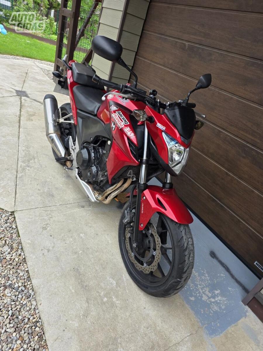 Red Honda CB 500F 2014 in Pasvalys, with an engine capacity of 0.50 L and mileage of 60 thousand km for 1749 €, photo 8 on AUTOMOTO.COM.LV