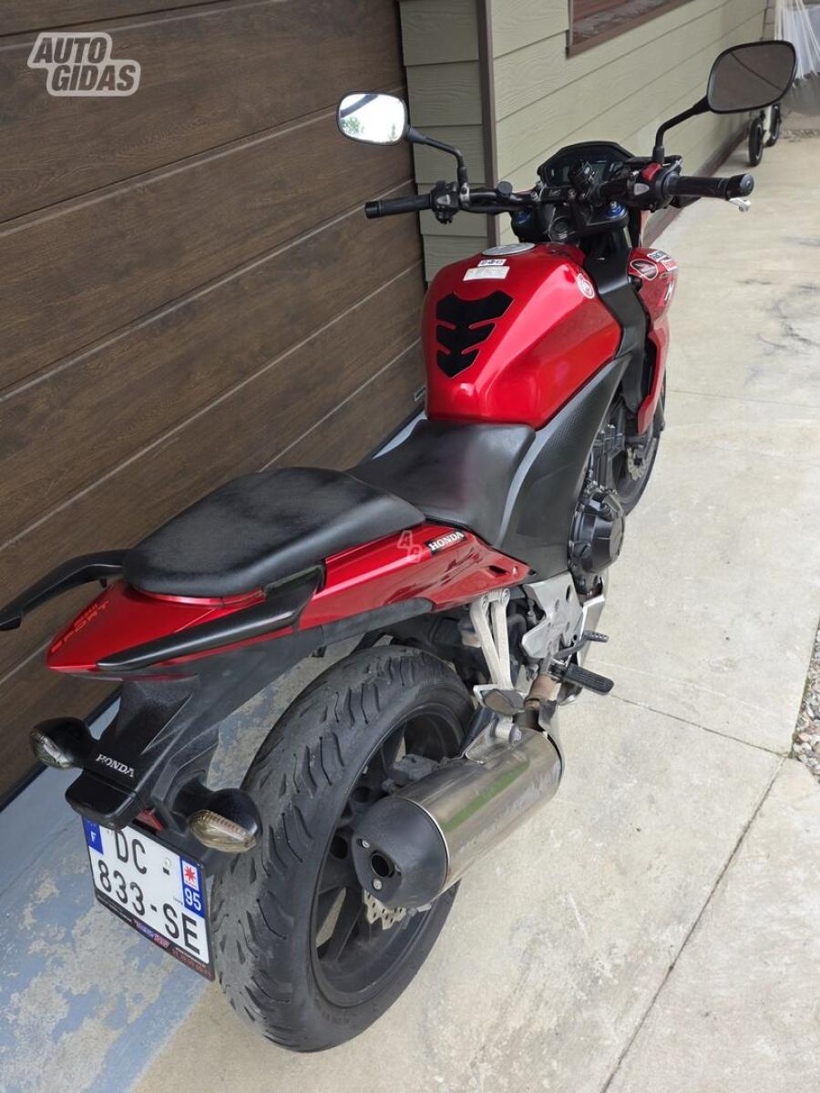 Red Honda CB 500F 2014 in Pasvalys, with an engine capacity of 0.50 L and mileage of 60 thousand km for 1749 €, photo 11 on AUTOMOTO.COM.LV