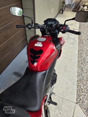 Red Honda CB 500F 2014 in Pasvalys, with an engine capacity of 0.50 L and mileage of 60 thousand km for 1749 €, photo 16 on AUTOMOTO.COM.LV