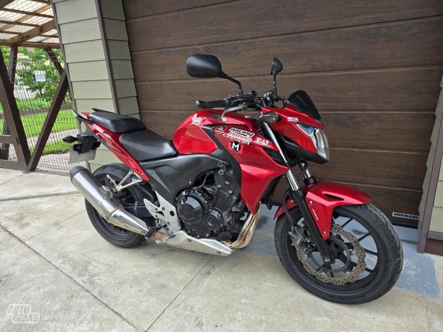 Red Honda CB 500F 2014 in Pasvalys, with an engine capacity of 0.50 L and mileage of 60 thousand km for 1749 €, photo 18 on AUTOMOTO.COM.LV