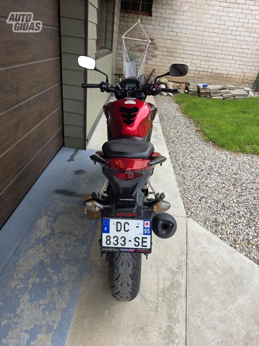 Red Honda CB 500F 2014 in Pasvalys, with an engine capacity of 0.50 L and mileage of 60 thousand km for 1749 €, photo 20 on AUTOMOTO.COM.LV