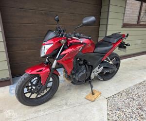 Red Honda CB 500F 2014 in Pasvalys, with an engine capacity of 0.50 L and mileage of 60 thousand km for 1749 €, photo 22 on AUTOMOTO.COM.LV