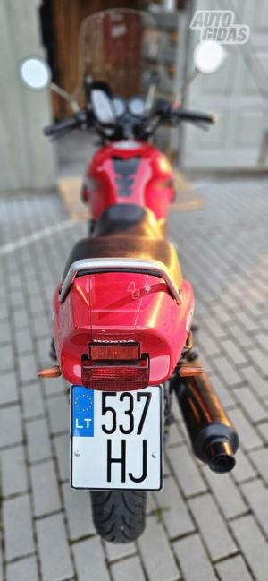 Red Honda CB 1998 in Kaunas, with an engine capacity of 0.50 L and mileage of 37 thousand km for 1800 €, photo 4 on AUTOMOTO.COM.LV