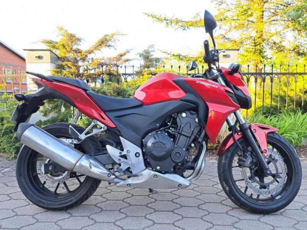 Red Honda CB 2013 in Pasvalys, with an engine capacity of 0.50 L and mileage of 17 thousand km for 2950 €, photo 1 on AUTOMOTO.COM.LV