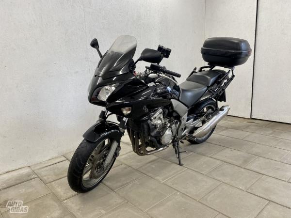 Black Honda CBF 2006 in Vilnius, with an engine capacity of 1.00 L and mileage of 80 thousand km for 2500 €, photo 1 on AUTOMOTO.COM.LV