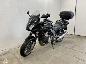 Melns Honda CBF 2006 Viļņa, ar dzinēja tilpumu 1.00 L un nobraukumu 80 tūkst. km par 2500 €, foto  vietnē AUTOMOTO.COM.LV