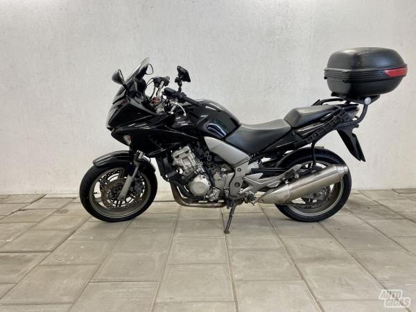 Black Honda CBF 2006 in Vilnius, with an engine capacity of 1.00 L and mileage of 80 thousand km for 2500 €, photo 3 on AUTOMOTO.COM.LV