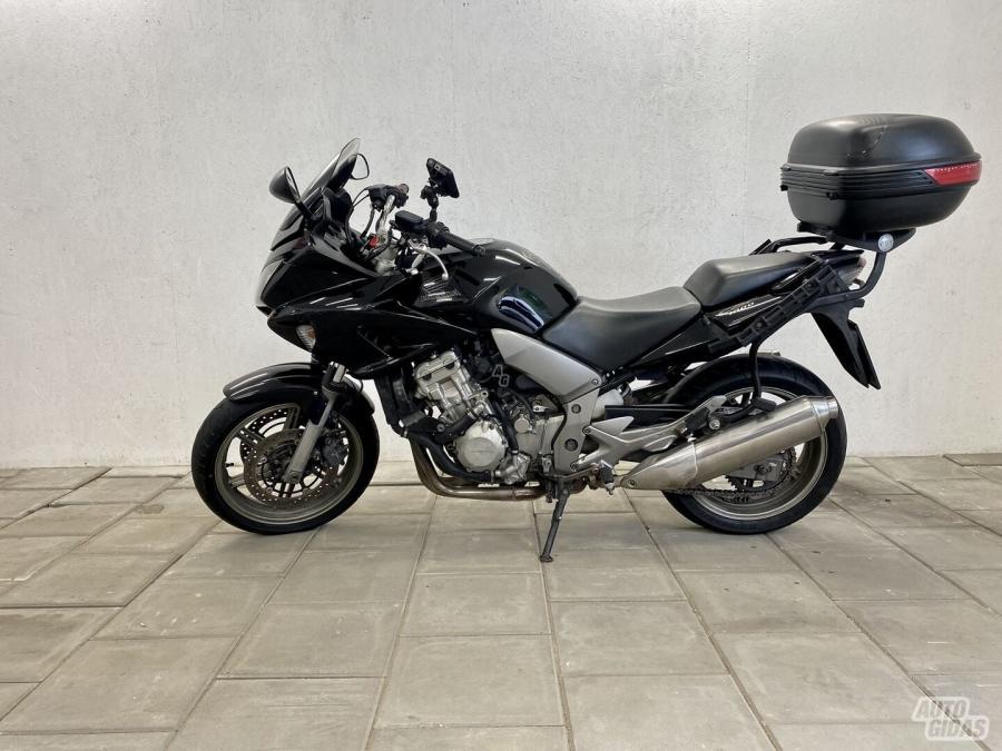 Black Honda CBF 2006 in Vilnius, with an engine capacity of 1.00 L and mileage of 80 thousand km for 2500 €, photo 4 on AUTOMOTO.COM.LV