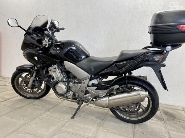 Black Honda CBF 2006 in Vilnius, with an engine capacity of 1.00 L and mileage of 80 thousand km for 2500 €, photo 4 on AUTOMOTO.COM.LV