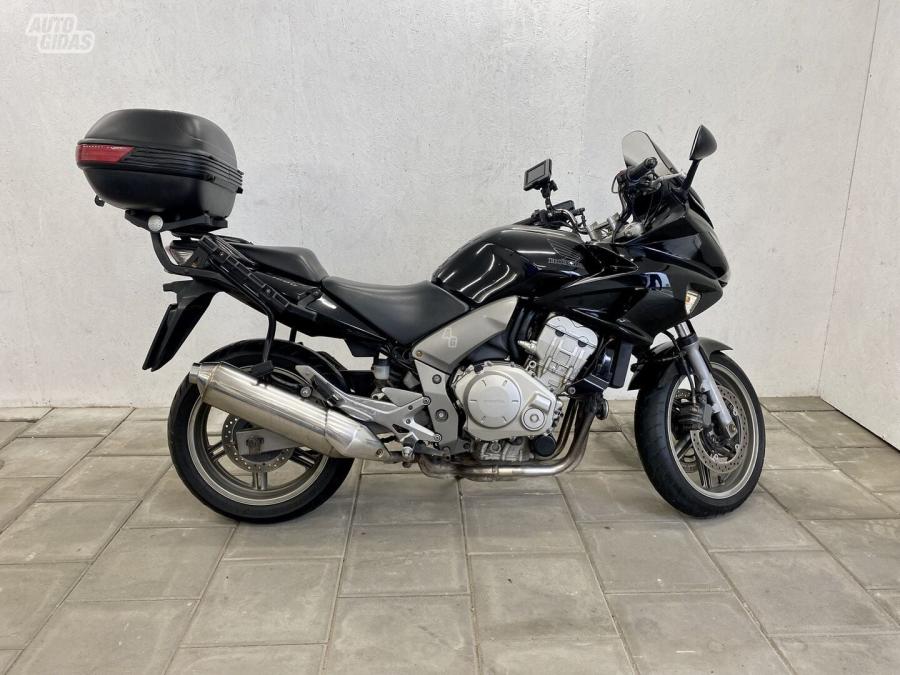 Black Honda CBF 2006 in Vilnius, with an engine capacity of 1.00 L and mileage of 80 thousand km for 2500 €, photo 9 on AUTOMOTO.COM.LV