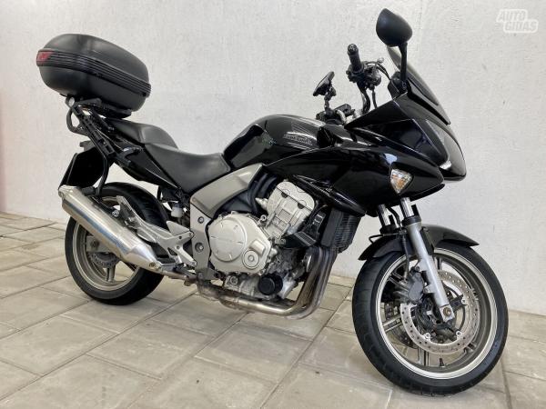 Black Honda CBF 2006 in Vilnius, with an engine capacity of 1.00 L and mileage of 80 thousand km for 2500 €, photo 9 on AUTOMOTO.COM.LV