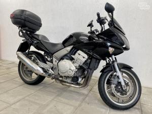 Black Honda CBF 2006 in Vilnius, with an engine capacity of 1.00 L and mileage of 80 thousand km for 2500 €, photo 10 on AUTOMOTO.COM.LV