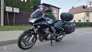Black Honda CBF 2007 in Alytus, with an engine capacity of 1.00 L and mileage of 57 thousand km for 3400 €, photo  on AUTOMOTO.COM.LV
