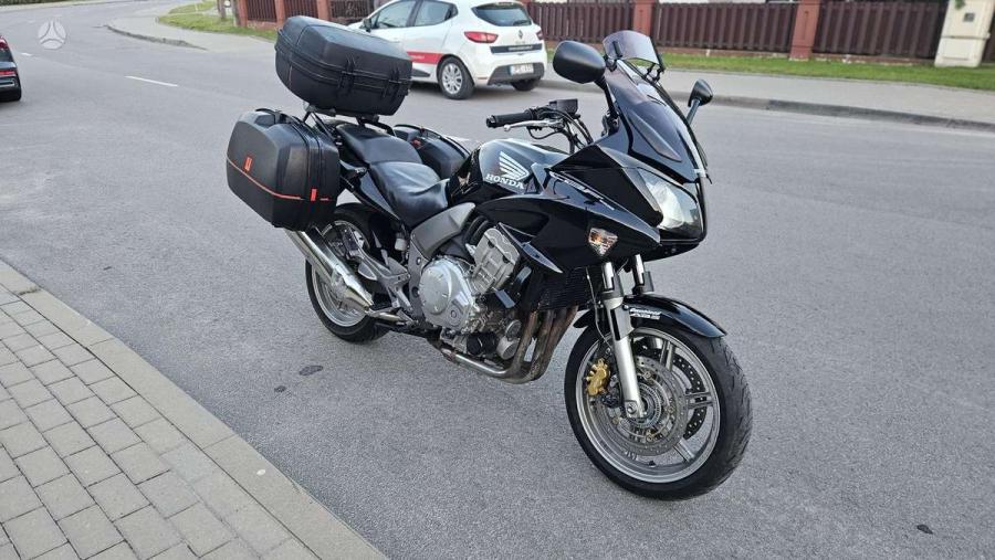 Black Honda CBF 2007 in Alytus, with an engine capacity of 1.00 L and mileage of 57 thousand km for 3400 €, photo 9 on AUTOMOTO.COM.LV