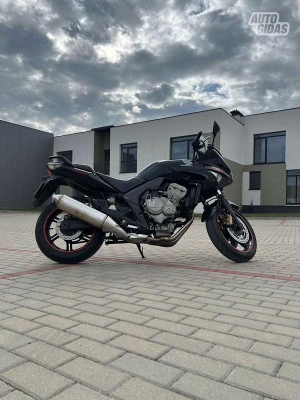 Melns Honda CBF 2010 Viļņa, ar dzinēja tilpumu 0.60 L un nobraukumu 82 tūkst. km par 2799 €, foto 1 vietnē AUTOMOTO.COM.LV