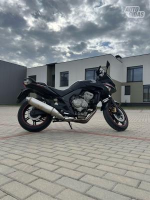 Black Honda CBF 2010 in Vilnius, with an engine capacity of 0.60 L and mileage of 82 thousand km for 2799 €, photo  on AUTOMOTO.COM.LV