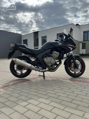 Black Honda CBF 2010 in Vilnius, with an engine capacity of 0.60 L and mileage of 82 thousand km for 2799 €, photo 4 on AUTOMOTO.COM.LV