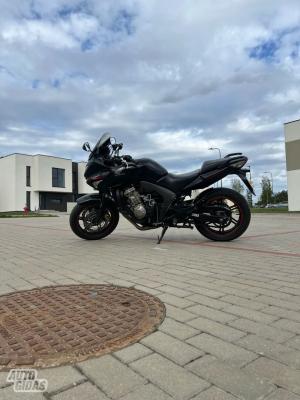 Black Honda CBF 2010 in Vilnius, with an engine capacity of 0.60 L and mileage of 82 thousand km for 2799 €, photo 6 on AUTOMOTO.COM.LV