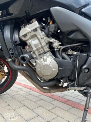 Black Honda CBF 2010 in Vilnius, with an engine capacity of 0.60 L and mileage of 82 thousand km for 2799 €, photo 23 on AUTOMOTO.COM.LV