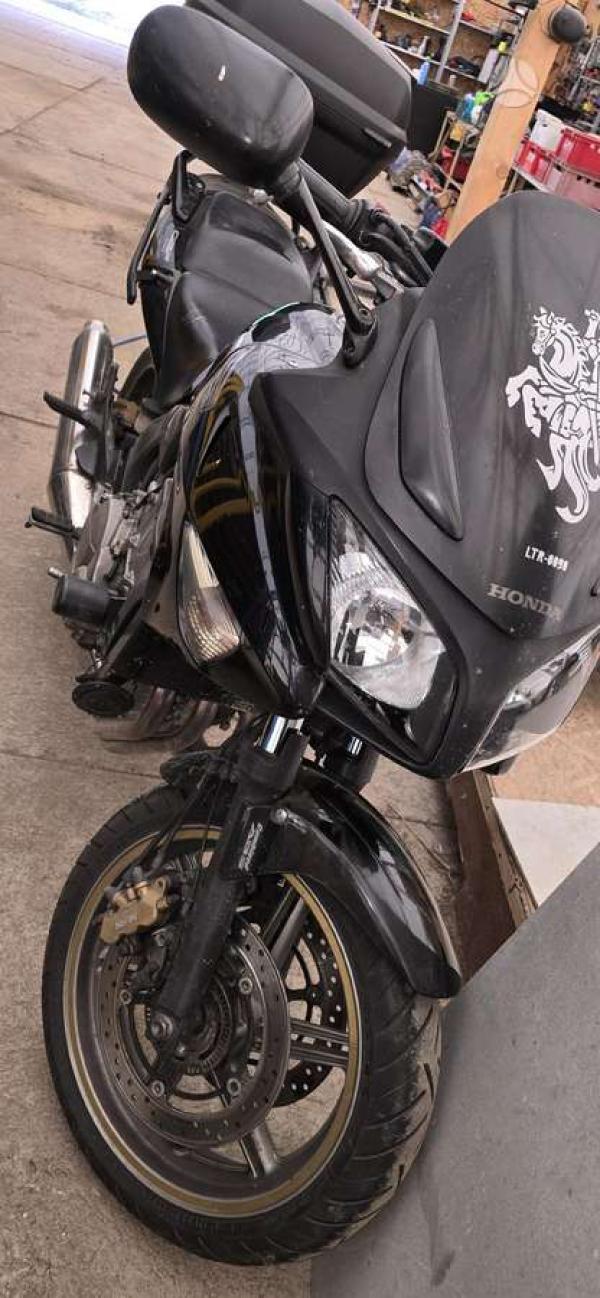 Black Honda CBF 2010 in Vilnius, with an engine capacity of 0.60 L and mileage of 30 thousand km for 3500 €, photo 1 on AUTOMOTO.COM.LV