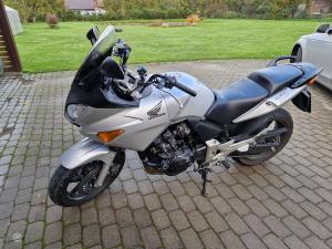 Grey Honda CBF 2004 in Telschi, with an engine capacity of 0.60 L and mileage of 40 thousand km for 2500 €, photo  on AUTOMOTO.COM.LV