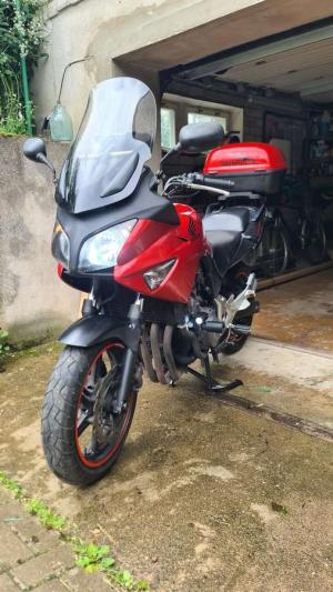 Red Honda CBF 2004 in Vilnius, with an engine capacity of 0.60 L and mileage of 74 thousand km for 2300 €, photo 3 on AUTOMOTO.COM.LV