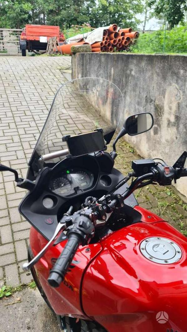 Red Honda CBF 2004 in Vilnius, with an engine capacity of 0.60 L and mileage of 74 thousand km for 2300 €, photo 4 on AUTOMOTO.COM.LV