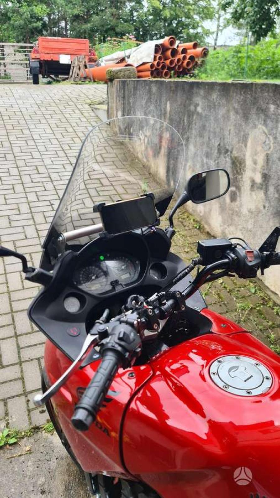 Red Honda CBF 2004 in Vilnius, with an engine capacity of 0.60 L and mileage of 74 thousand km for 2300 €, photo 5 on AUTOMOTO.COM.LV