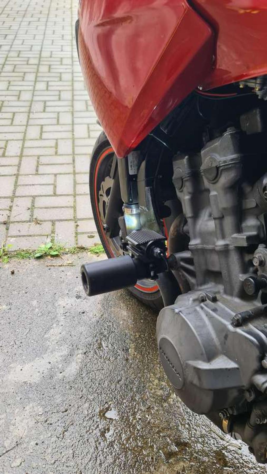 Red Honda CBF 2004 in Vilnius, with an engine capacity of 0.60 L and mileage of 74 thousand km for 2300 €, photo 7 on AUTOMOTO.COM.LV