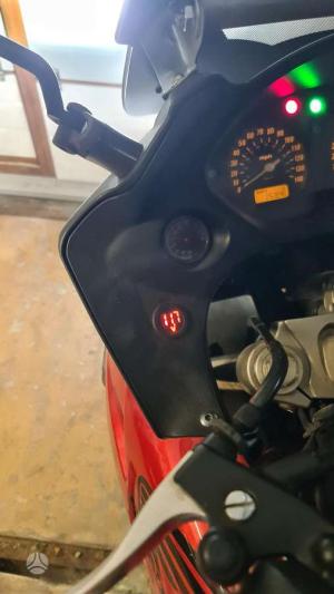 Red Honda CBF 2004 in Vilnius, with an engine capacity of 0.60 L and mileage of 74 thousand km for 2300 €, photo 9 on AUTOMOTO.COM.LV