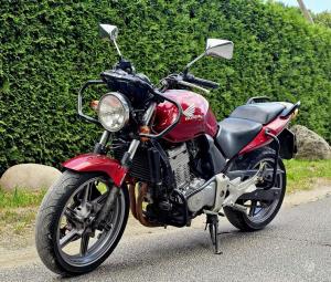 Red Honda CBF 2006 in Vilnius, with an engine capacity of 0.50 L and mileage of 65 thousand km for 1250 €, photo 4 on AUTOMOTO.COM.LV