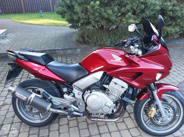 Red Honda CBF 2009 in Siauliai, with an engine capacity of 1.00 L and mileage of 57 thousand km for 2950 €, photo 6 on AUTOMOTO.COM.LV