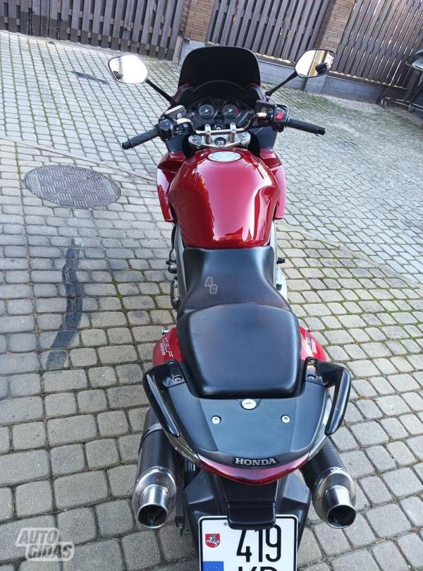 Red Honda CBF 2009 in Siauliai, with an engine capacity of 1.00 L and mileage of 57 thousand km for 2950 €, photo 9 on AUTOMOTO.COM.LV