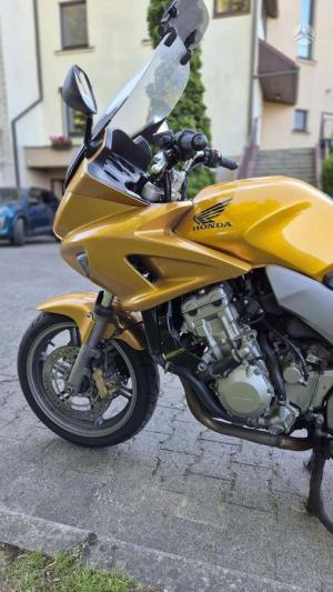 Dzeltens Honda CBF 2008 Kauņa, ar dzinēja tilpumu 1.00 L un nobraukumu 40 tūkst. km par 2750 €, foto 9 vietnē AUTOMOTO.COM.LV