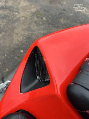 Красный Хонда CBR 1000RR 2006 в Утена, объемом двигателя 1.00 л и пробегом 69 тыс. км за 4350 €, фото 17 на AUTOMOTO.COM.LV