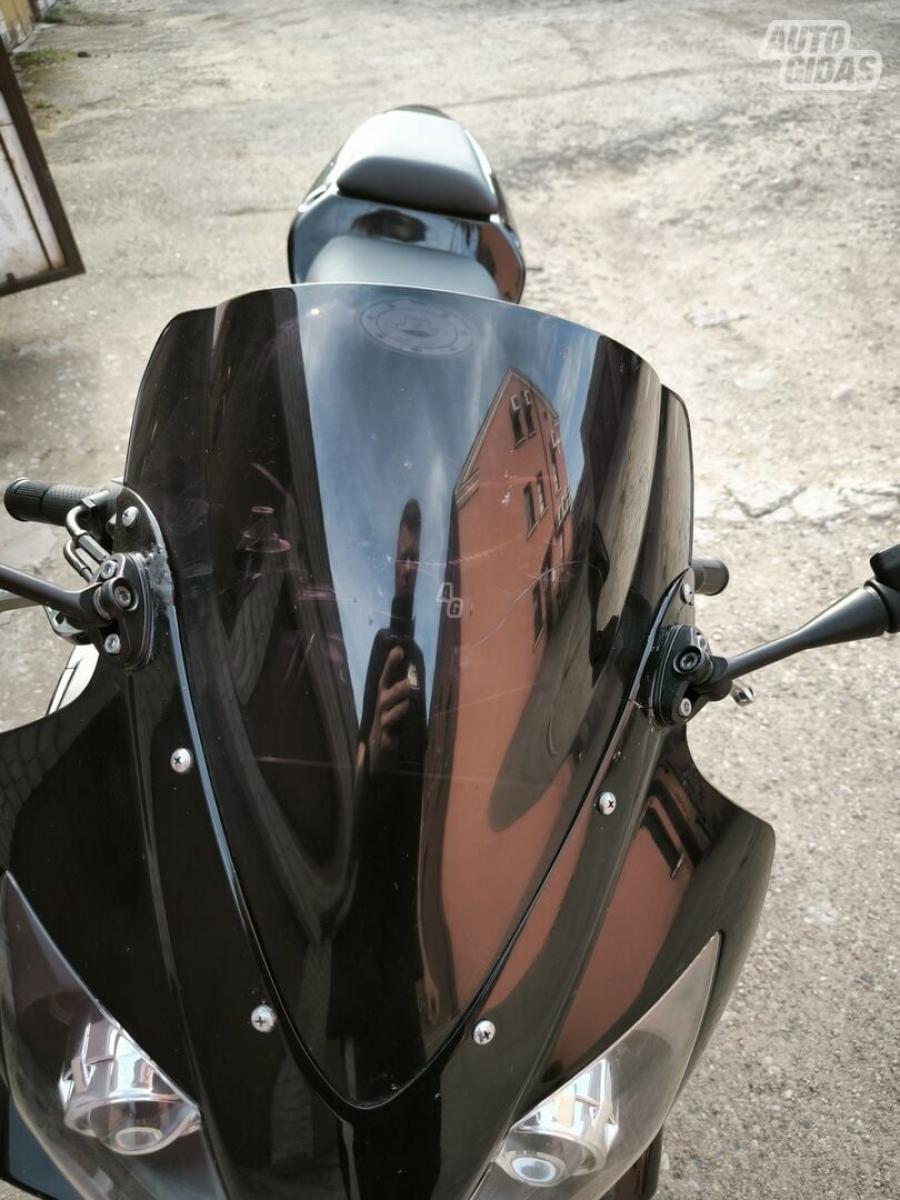 Melns Honda Cbr 2004 Kauņa, ar dzinēja tilpumu 0.60 L un nobraukumu 94 tūkst. km par 2600 €, foto 12 vietnē AUTOMOTO.COM.LV