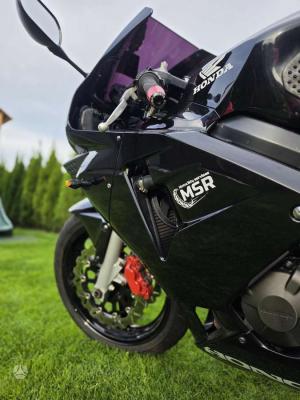 Black Honda Cbr 2005 in Kaunas, with an engine capacity of 0.60 L and mileage of 36 thousand km for 3333 €, photo 10 on AUTOMOTO.COM.LV