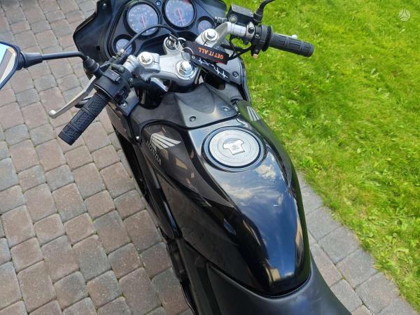 Black Honda Cbr 2009 in Kaunas, with an engine capacity of 0.13 L and mileage of 33 thousand km for 1500 €, photo 2 on AUTOMOTO.COM.LV