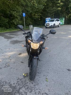 Black Honda Cbr 2012 in Mazeikiai, with an engine capacity of 0.13 L and mileage of 31 thousand km for 1500 €, photo 8 on AUTOMOTO.COM.LV