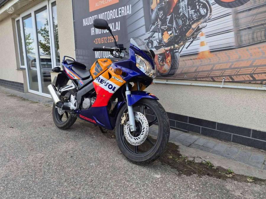 Orange Honda Cbr 2006 in Panevezys, with an engine capacity of 0.13 L and mileage of 5 thousand km for 1400 €, photo 1 on AUTOMOTO.COM.LV