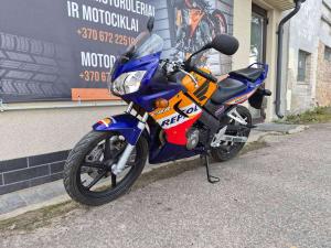 Orange Honda Cbr 2006 in Panevezys, with an engine capacity of 0.13 L and mileage of 5 thousand km for 1400 €, photo 3 on AUTOMOTO.COM.LV