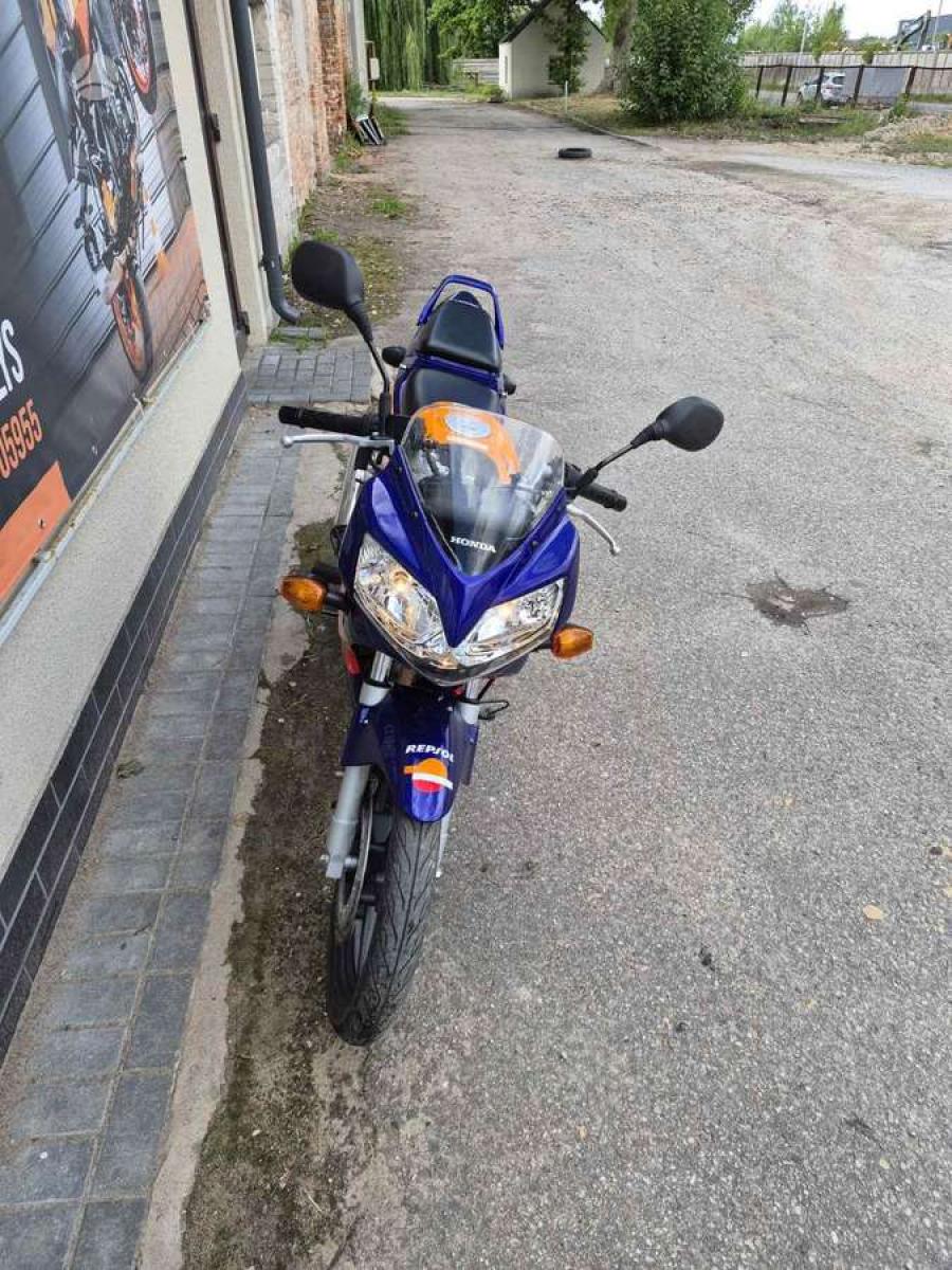 Orange Honda Cbr 2006 in Panevezys, with an engine capacity of 0.13 L and mileage of 5 thousand km for 1400 €, photo 6 on AUTOMOTO.COM.LV