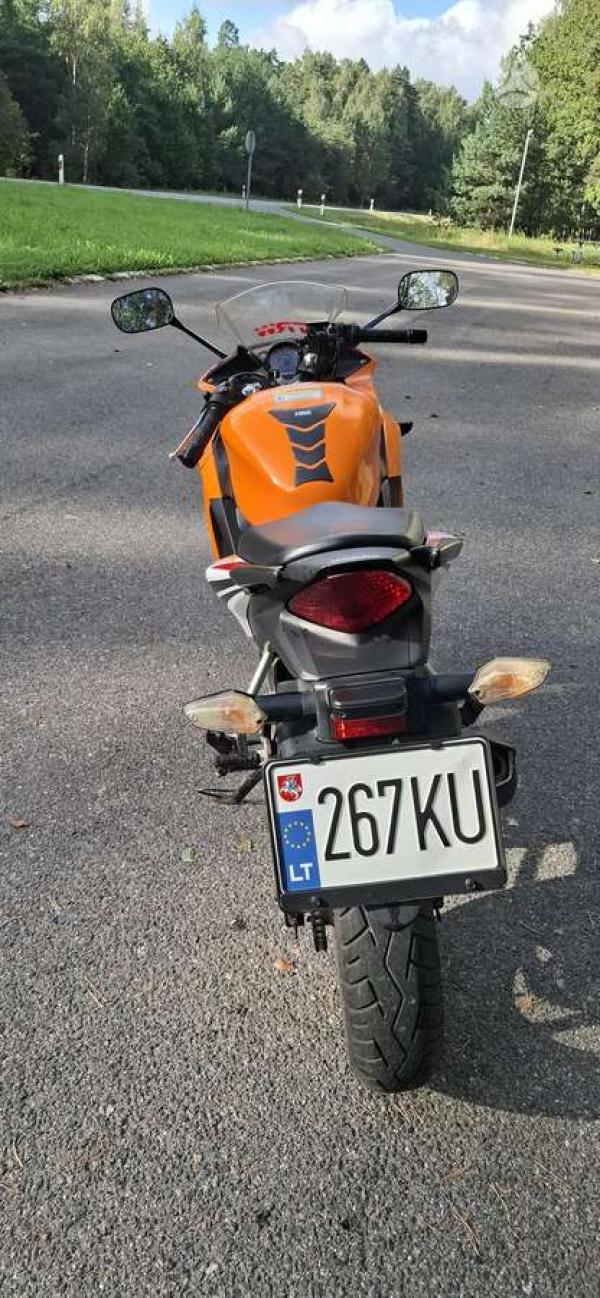 Orange Honda Cbr 2016 in Silute, with an engine capacity of 0.13 L and mileage of 24 thousand km for 1700 €, photo 6 on AUTOMOTO.COM.LV