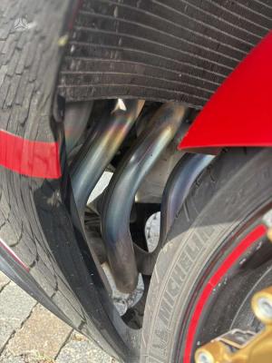 Red Honda Cbr 2002 in Kaunas, with an engine capacity of 0.95 L and mileage of 64 thousand km for 4200 €, photo 12 on AUTOMOTO.COM.LV